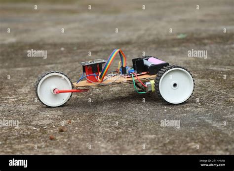 View Of A Robotic Car Having 3 Wheels Robot Car That Is Controlled