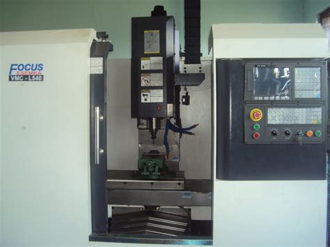 Belajar Mesin CNC Milling VMC L540 Tulisan Guru Mesin