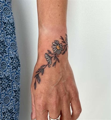 Daisies Tattoo On Wrist