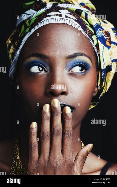Shes A True African Beauty A Beautiful African Woman Posing Against A