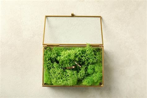 Premium Photo Golden Wedding Rings In A Box On A Light Background