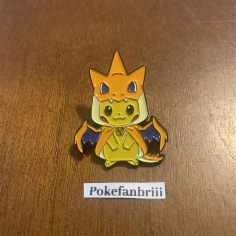 Mavin ⭐️pokémon Pin Poncho Wearing Pikachu Charizard