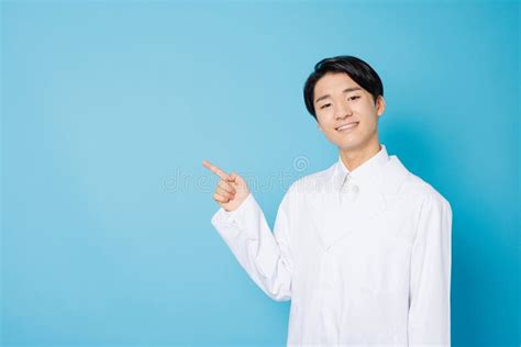 Asian Teenage Boy In Lab Coat With Hand Gesture Stock Image Image Of