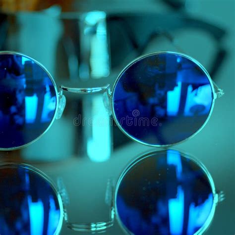 Collection Of Sunglasses On Big Reflection Mirror Stock Image Image