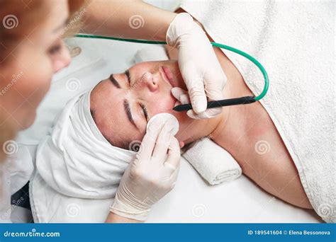 Woman Dermatologist Surgeon Preparing A Professional Electrocautery