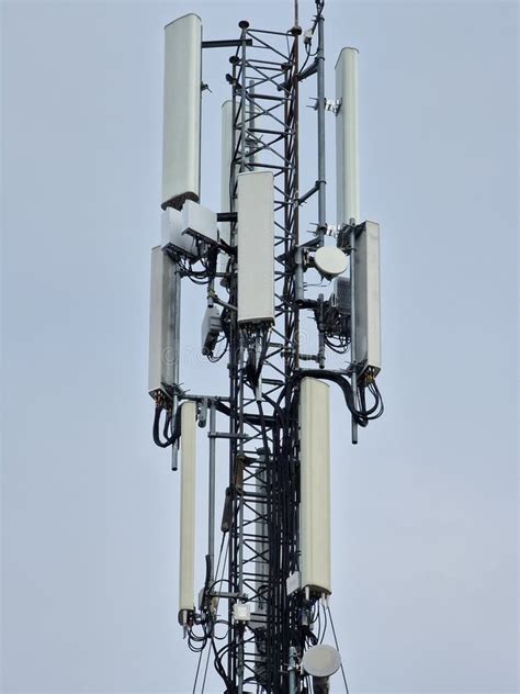 Multiple Antennas On The 4G Base Station Antenna Tower Stock Photo