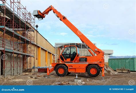 Rotating Telehandler At Work In An Industrial Redevelopment Area Stock