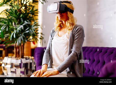 Attractive Blond Woman Wearing Headset Virtual Reality Vision Goggles