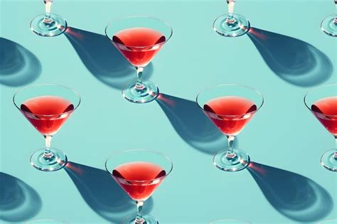 Premium Photo Pattern Of Wine Glasses On Blue Background