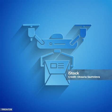 종이 잘라 드론 배달 개념 아이콘 파란색 배경에 격리 패키지를 운반하는 쿼드로 콥터 운송 물류 개념 종이 아트 스타일입니다 벡터