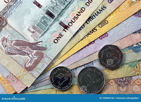 Close Up Dirhams Currency AED Bank Note And Coins United Arab