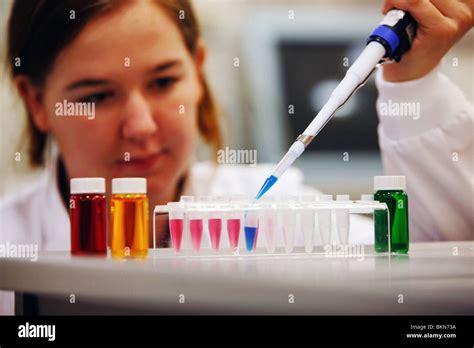 Female University Babe In A Science Lab Performing An Experiment Stock Photo Alamy