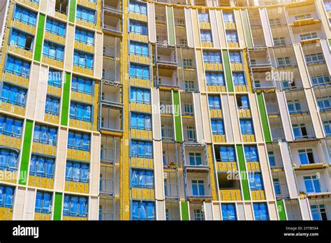 Cladding And Warming Wall Of Monolithic House Under Construction Insulating Installation Of