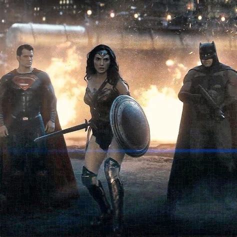 Some People Are Dressed Up In Costumes And Holding Swords While Standing On A City Street At Night