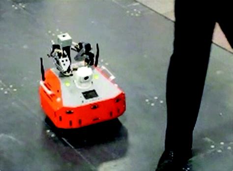 Fuzzy Logic Navigation And Obstacle Avoidance By A Mobile Robot In An Unknown Dynamic