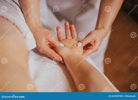 Woman Getting A Relaxing Hand Massage Treatment In The Spa Salon Stock