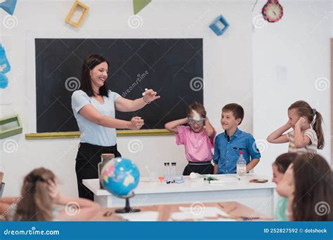 Elementary School Science Classroom Enthusiastic Teacher Explains