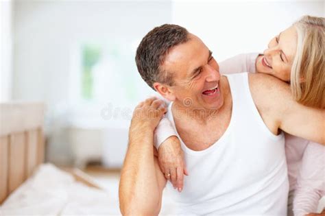 Cheerful Mature Man And Wife Having Fun Together Portrait Of A