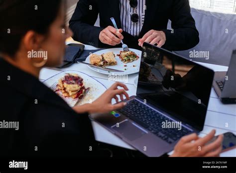 A Lovely Businesswoman Finished With Her Breakfast And Kept Working On