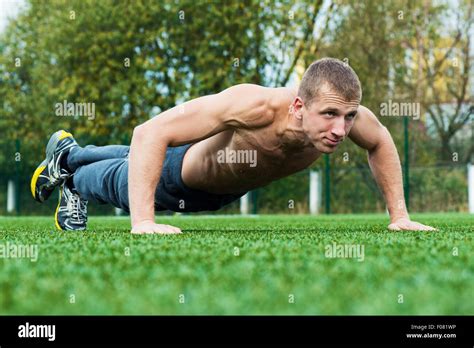 Muscle Man Making Push Ups Outdoors Stock Photo Alamy