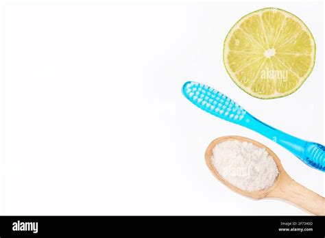 Toothbrush Bicarbonate And Lemon Citrus Latifolia Stock Photo Alamy
