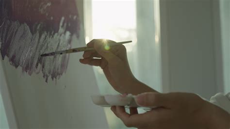 Close Up Hand Professional Artist Use Paintbrush In Abstract Art For