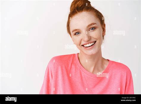 Portrait Of Happy Tender Ginger Girl With Blue Eyes And Freckles