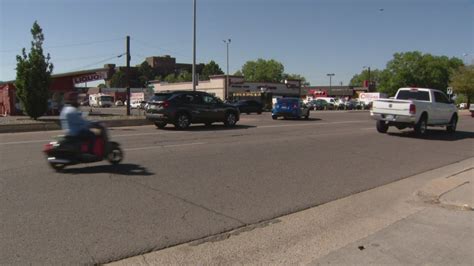 Man Arrested In Shooting Outside Aurora Liquor Store