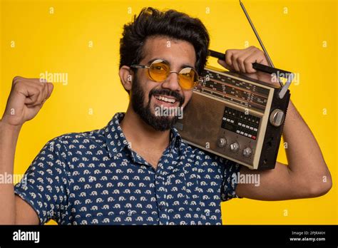 Indian Man Using Retro Tape Record Player To Listen Music Disco
