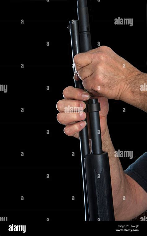 Gunsmith Removing Barrel Of A Gauge Pump Action Shotgun For Cleaning Gun Cleaning After Each