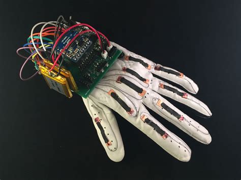 low cost smart glove translates american sign language alphabet university of california