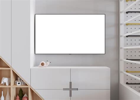 子供部屋のテレビのモックアップ空白の白い画面を備えたledテレビ子供の映画アプリゲームのプレゼンテーションを広告するためのコピースペース