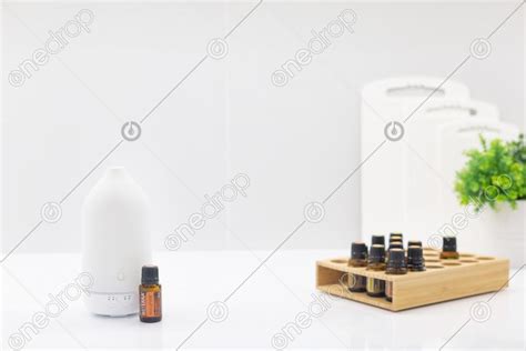 Essential Blend Metapwr With Diffuser Laluz On Table By Kseniia Che