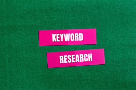 Premium Photo Keyword Research Message Written On Pink Paper With