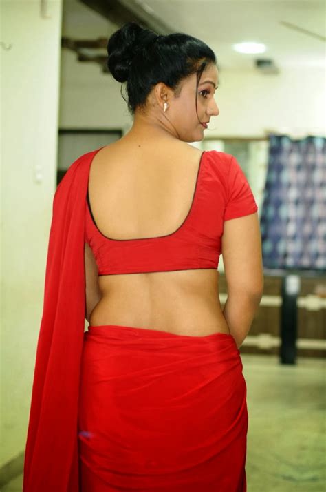 Actress Apoorva Hot Navel Show In Red Saree Photo Gallery Movieezreel