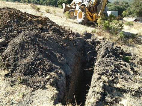 Equipment To Install A Leach Field