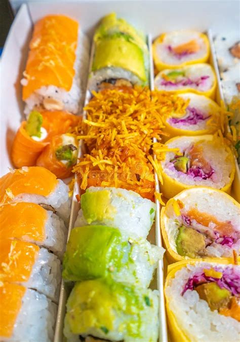 Large Sushi Set On Black An Assortment Of Various Maki Nigiri And