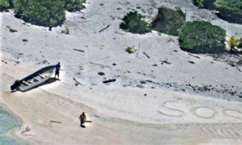 Castaways Rescued From Remote Island After Sos Spotted In Sand