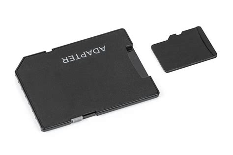 Premium Photo MicroSD Memory Card With Adapter On White Background