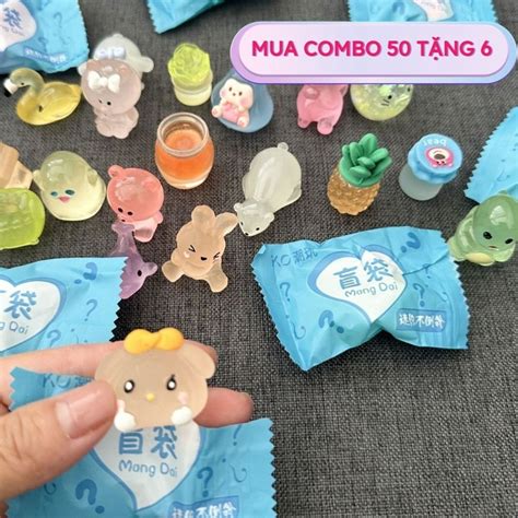 Mua set 50 tặng 6 Set 50 túi mù nhân phẩm kẹo mù bóc quà cham động
