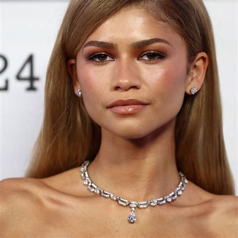 Zendaya Wore A Plunging Red Gown To Celebrate Her Historic Emmys Winsee Pics Glamour