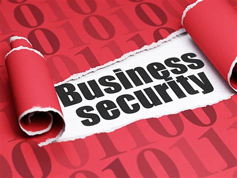 Security In Business Black Text Shielded By A Torn Piece Of Paper Photo