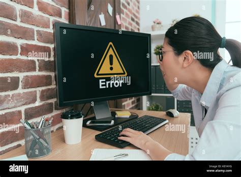 Beautiful Elegant Business Woman Looking At Computer Error Information Feeling Puzzled When She