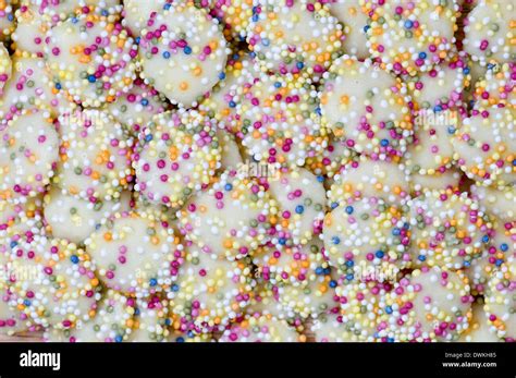 White Chocolate Buttons With Coloured Sprinkles Or Hundreds And Stock Photo Alamy