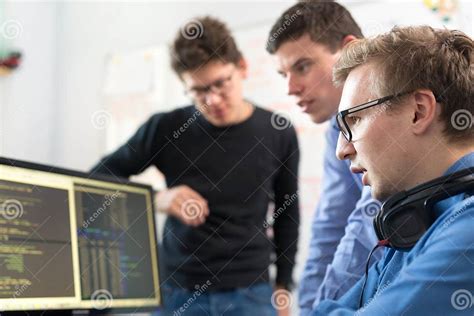 Startup Business Software Developer Working On Desktop Computer Stock