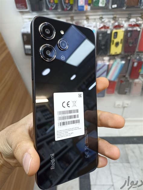 گوشی شبیه آیفون 13 شیائومی Redmi 12 موبایل قم، آذر دیوار