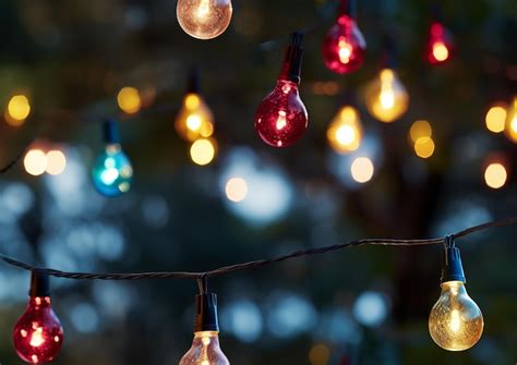 Premium Photo Numerous Colored Festive String Lights Hanging Taut In