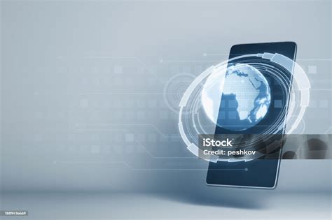 모형 장소와 함께 콘크리트 벽 배경에 창조적 인 빛나는 지구 홀로그램과 스마트 폰의 클로즈업 메타버스 장치 지도 및 글로벌
