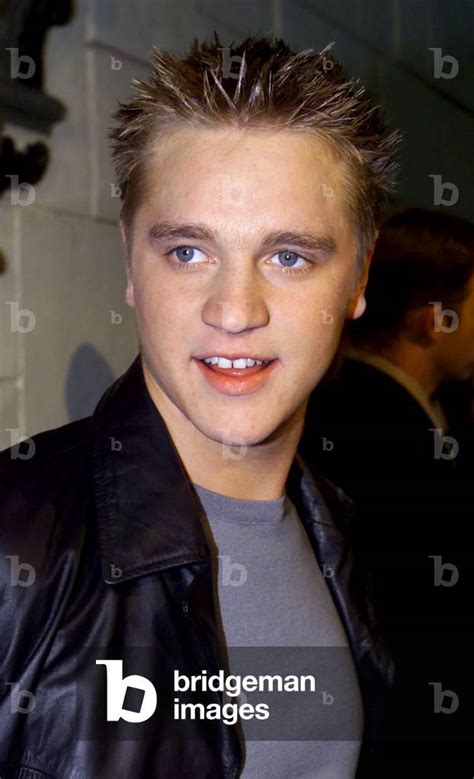 Image Of Actor Devon Sawa Poses For Photographers At The Premiere Of
