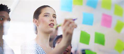 Business Woman And Glass Wall For Sticky Note With Teamwork Writing